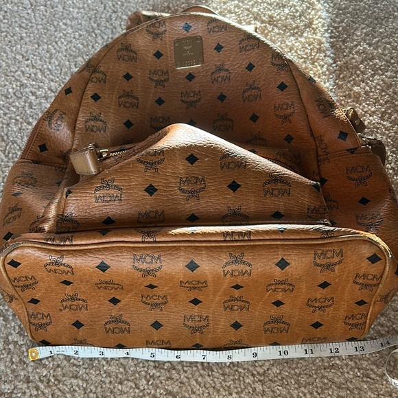 MCM | Bags | Mcm Vintage Cognac Big Size Logo Pattern Backpack In Good ...